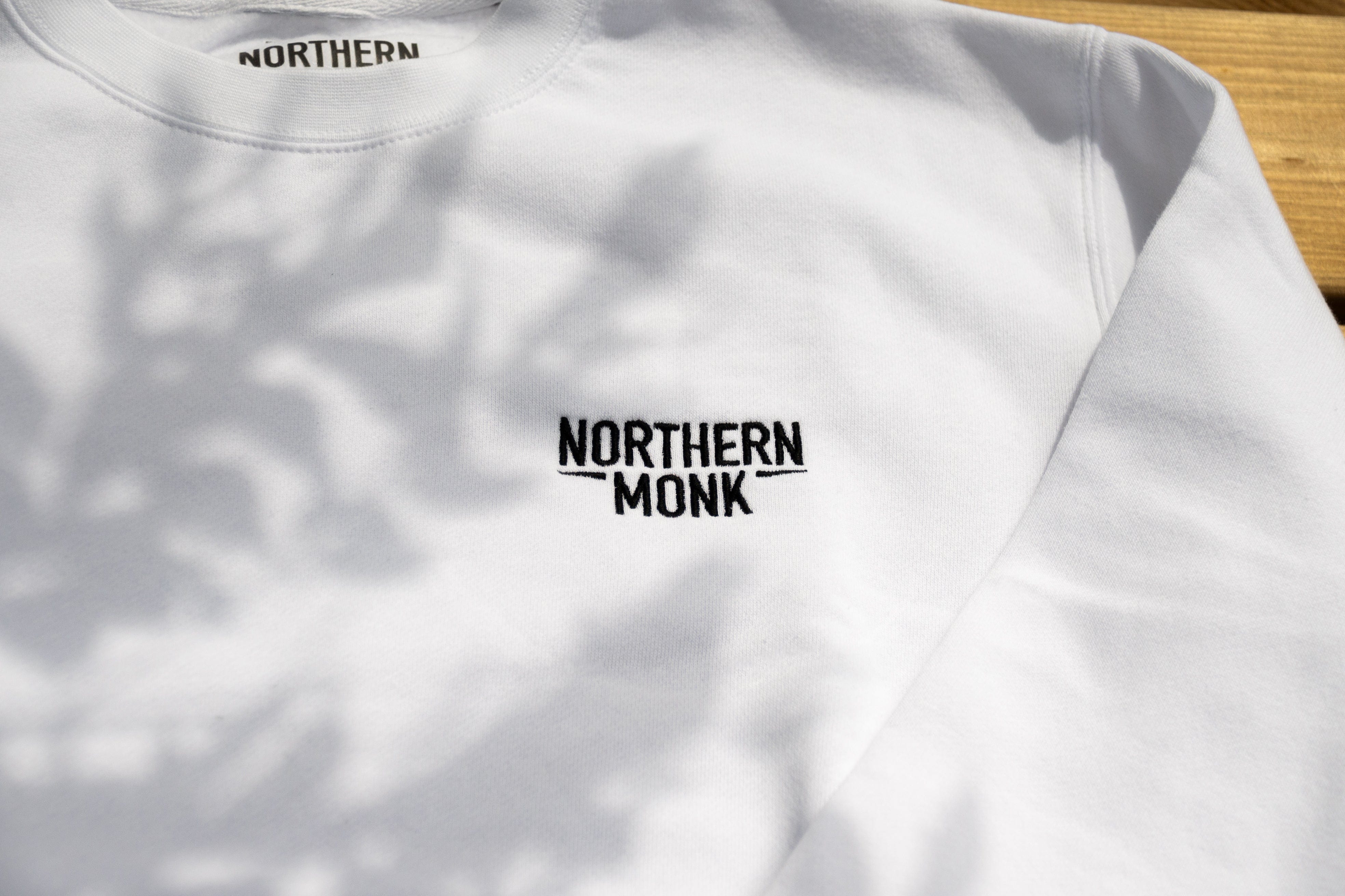 2023 VINTAGE WHITE EMBROIDERED NORTHERN MONK SWEATER – Northern Monk